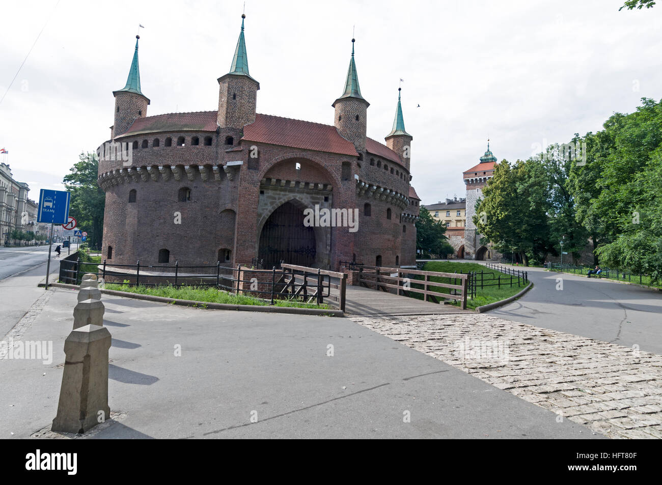 The medieval built barbican surrounded by a moat with drawbridge and on ...