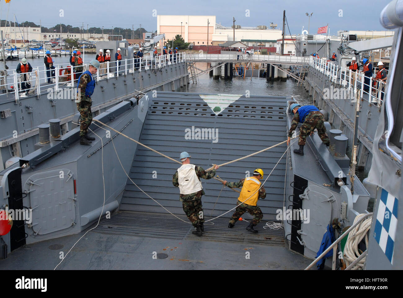 061102-N-4238B-170 Virginia Beach, Va. (Nov. 2, 2006) - Line handlers ...