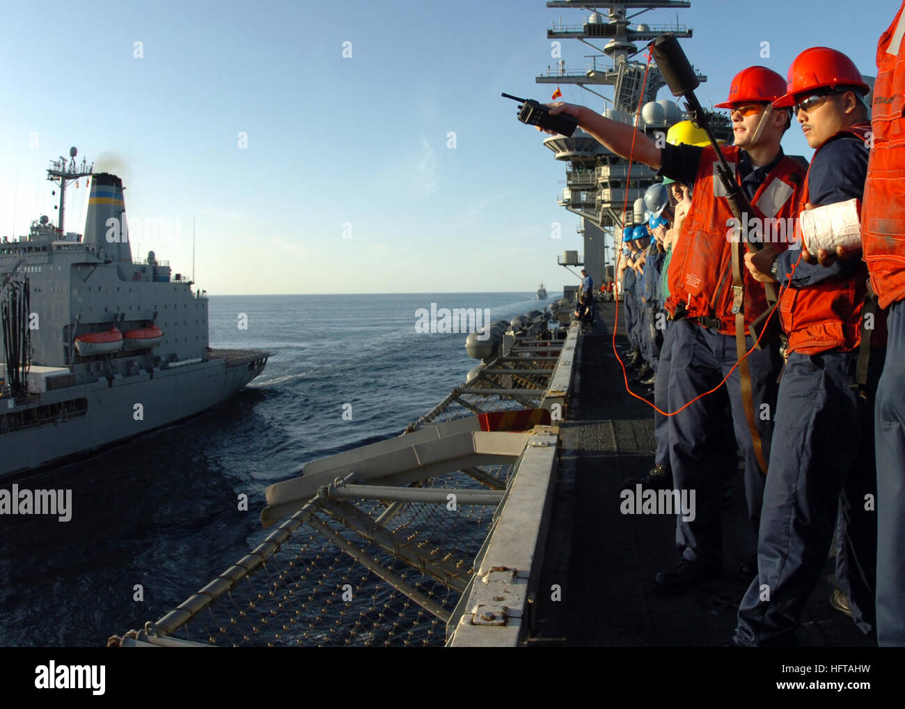 061127-N-8907D-004 Arabian Sea (Nov. 27, 2006) - Sailors aboard the ...