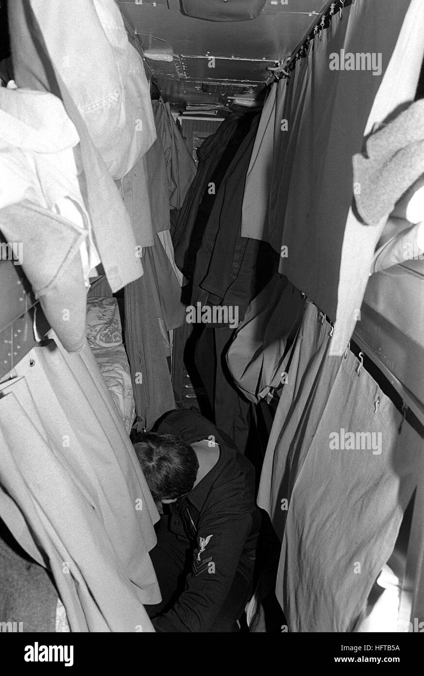 A petty officer aboard the attack submarine USS BONEFISH (SS-582) makes ...