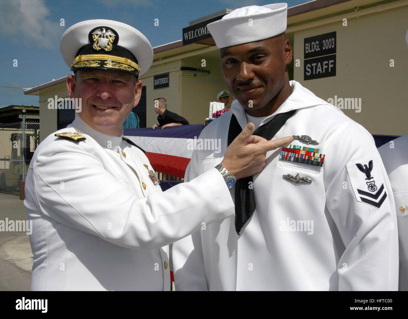 The Navy's first Expeditionary Warfare pin is presented to a Sailor ...