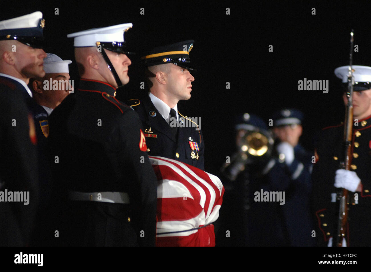 The casket of Gerald R. Ford is carried by the Ceremonial Honor Guard ...