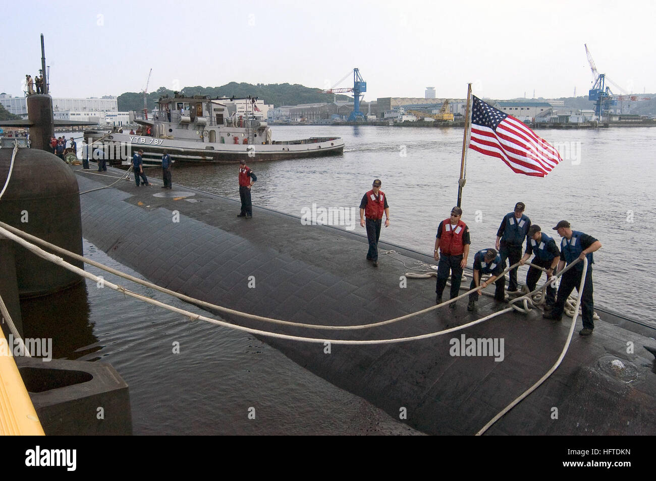 070627-N-1251W-005 YOKOSUKA, Japan (June 27, 2007) - Sailors attached ...