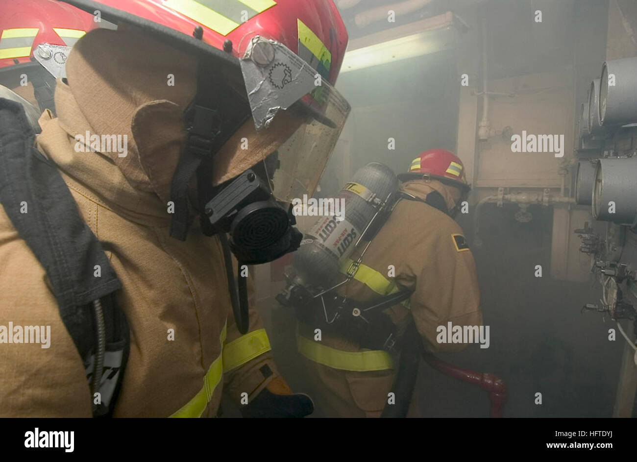 070126-N-8534H-013 Pacific Ocean (Jan. 26, 2007) - Sailors enter an ...