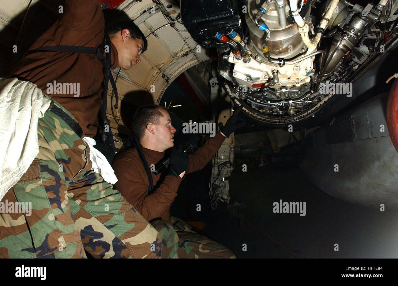 An Airman demonstrates a turnaround inspection on an EA-6B Prowler from ...