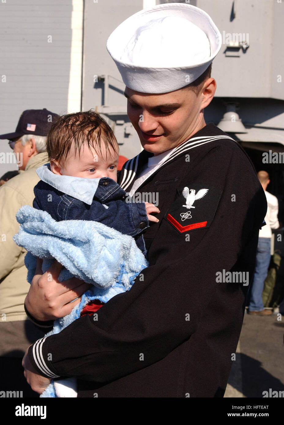 Crew members of USS Boone return from a six-month deployment supporting ...