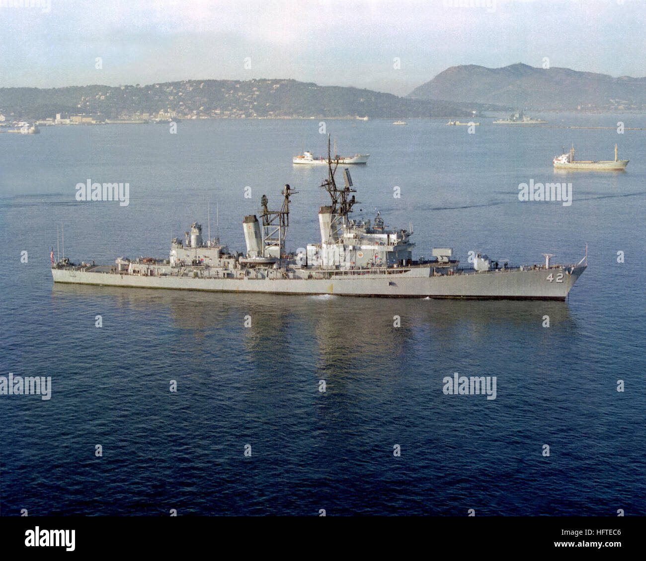 The guided missile destroyer USS Mahan (DDG-42) is anchored in harbor ...