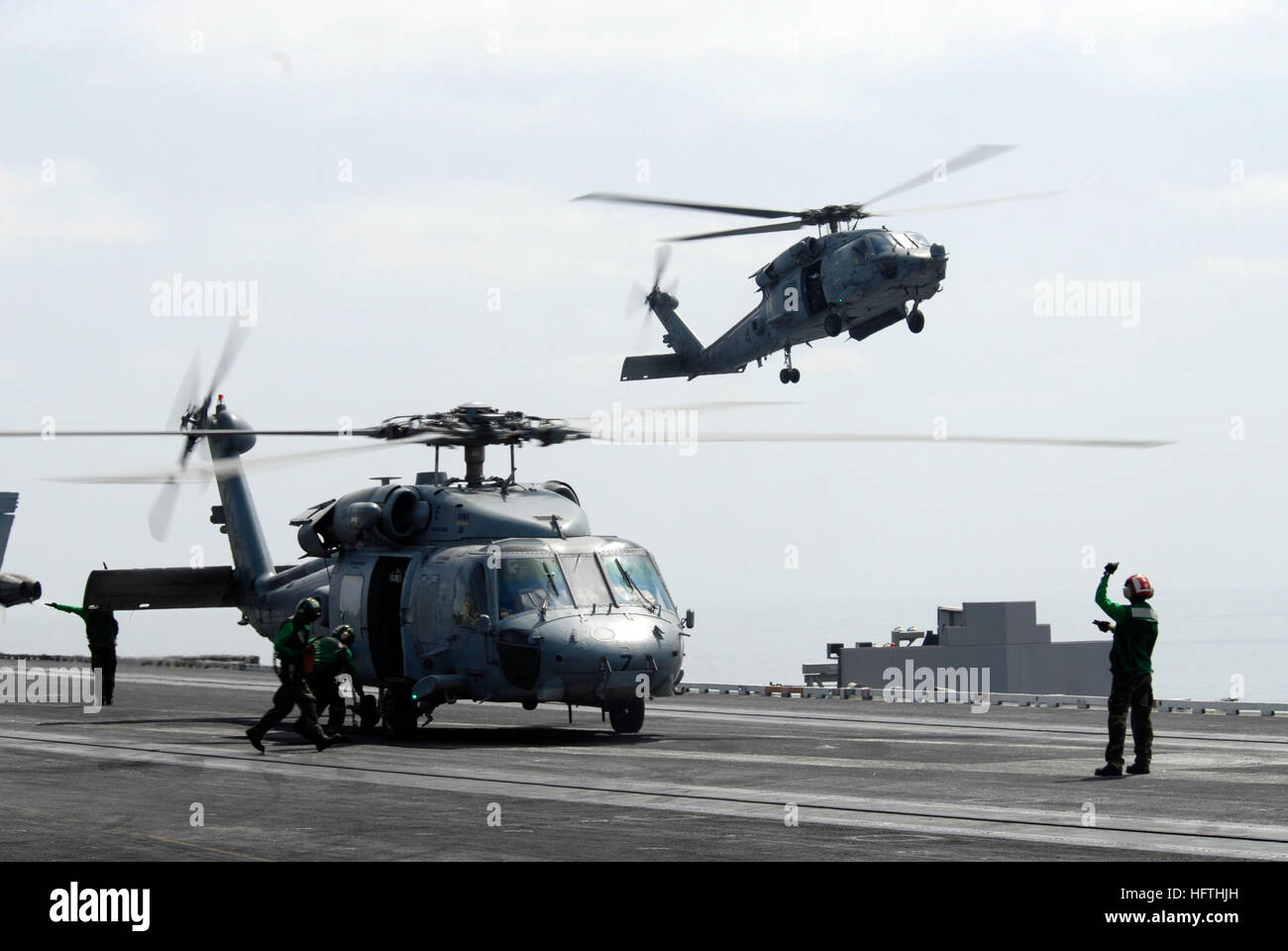 070316-N-8157C-001 ARABIAN SEA (Mar. 16, 2007) - Two HH-60H Seahawks ...