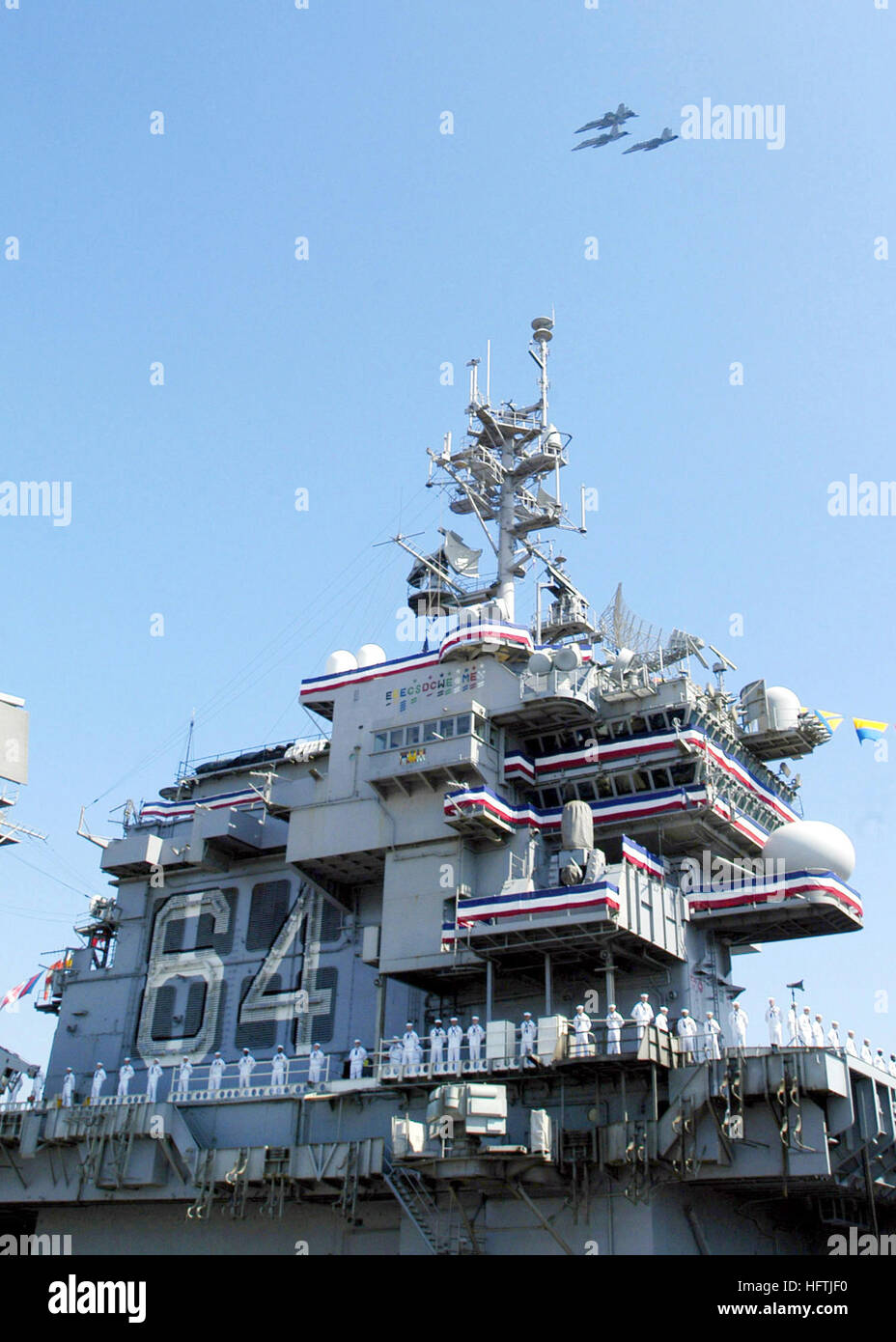 A three-plane formation of US Marine Corps (USMC) F/A-18 Hornets from ...