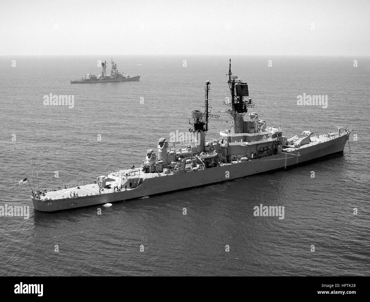 An aerial starboard quarter view of the guided missile cruiser USS ...
