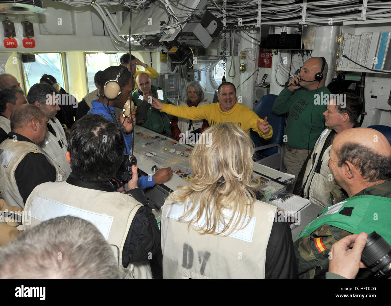 Visitors from the Spanish military receive a tour of flight deck ...