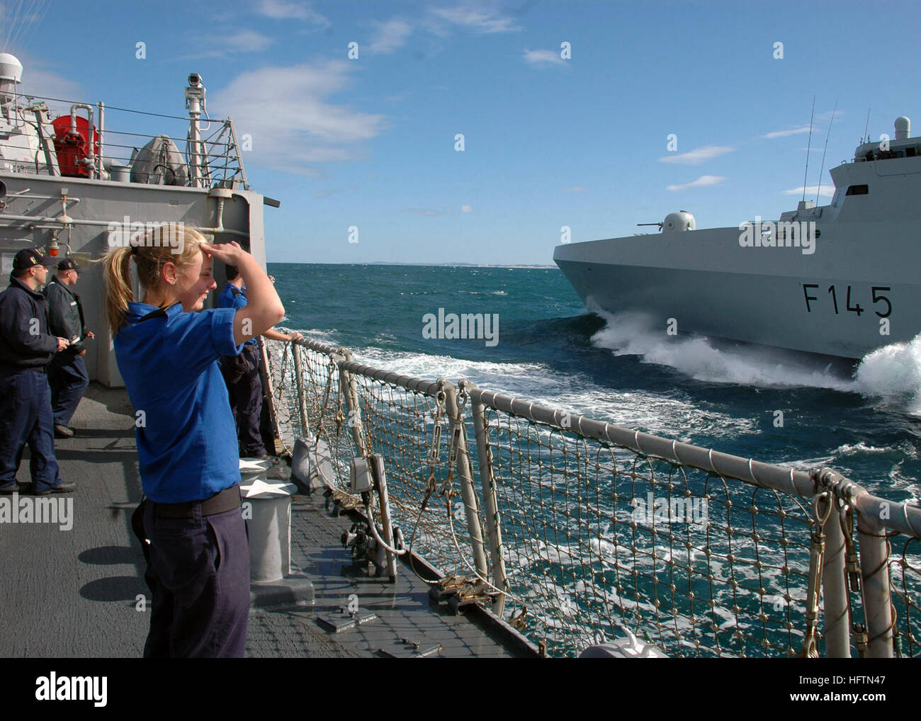 South African Navy ship SAS Amatola (F145) comes alongside USS Arleigh ...
