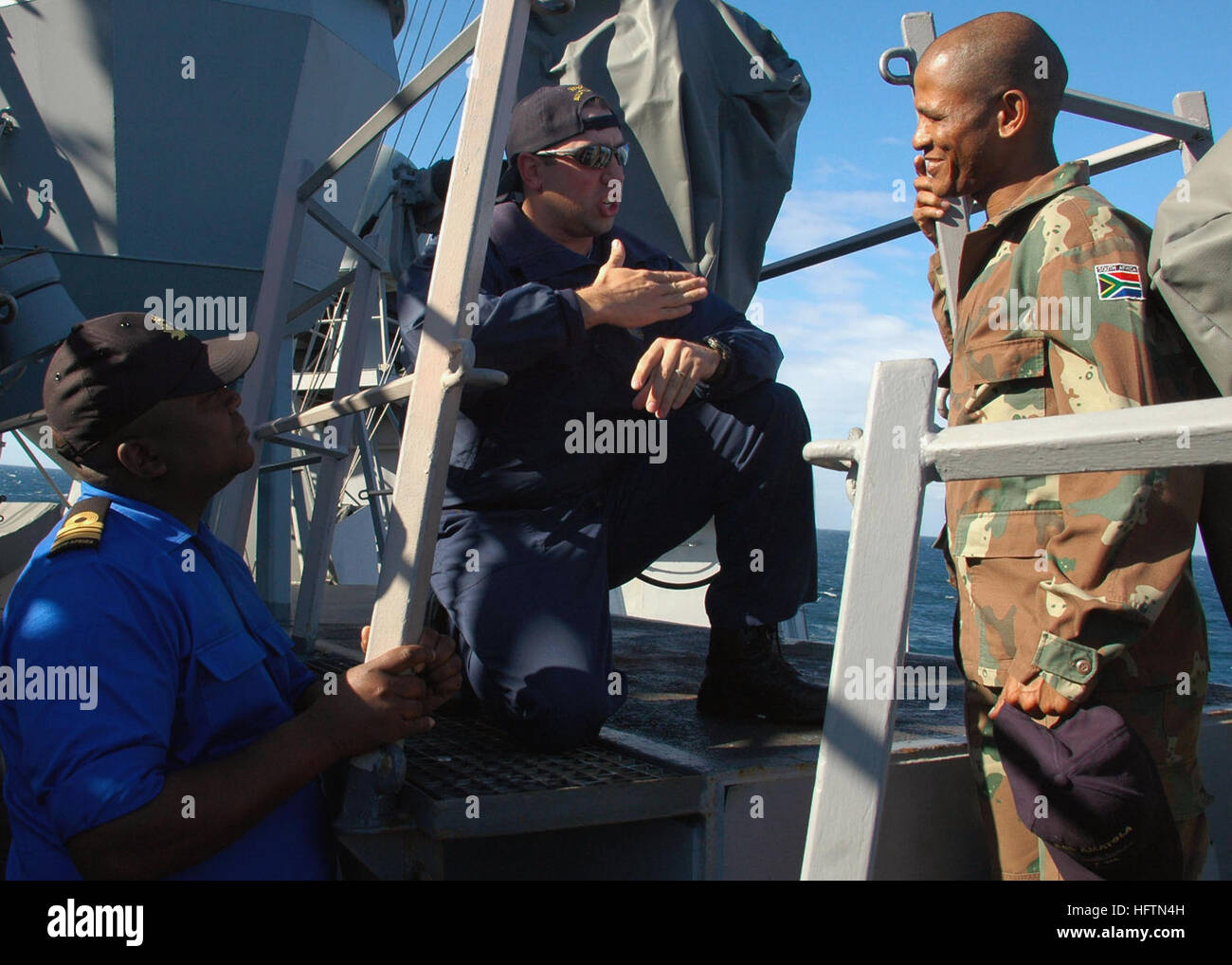 USS Arleigh Burke (DDG 51) conducts cooperative at-sea exercises with ...
