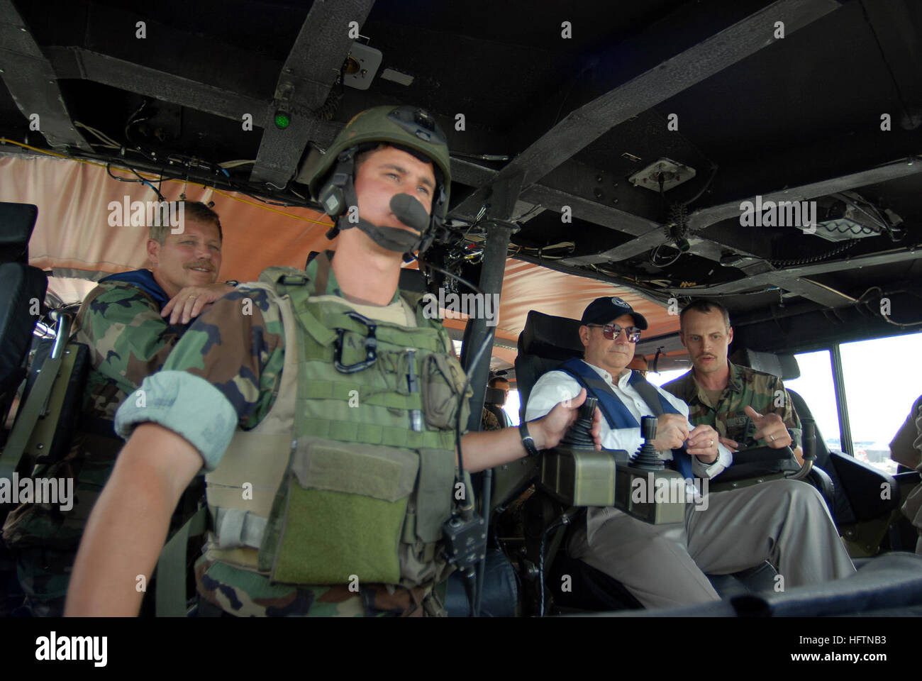A Special Warfare Boat Operator 1st Class navigates a Mark Five Special ...