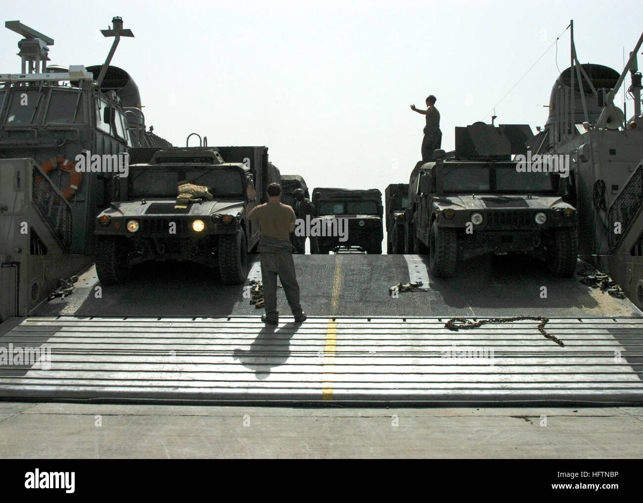 x-default US Navy 070506-N-1467R-027 Sailors assigned to Assault Craft ...