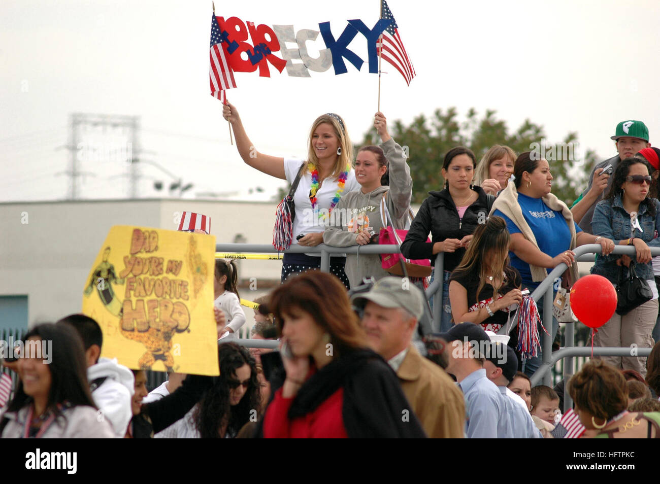 Friends and family of Sailors cheer as amphibious assault ship USS ...