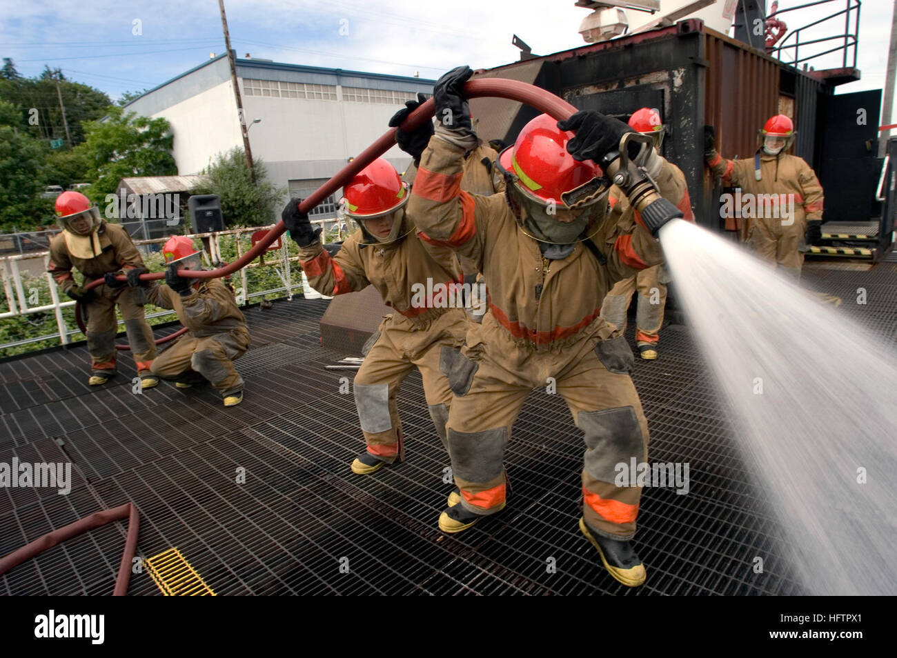 070606-N-3390M-001 SEATTLE (June 6, 2007) - A group of 16 Sailors ...