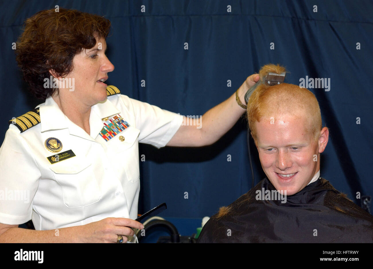 Induction haircut hi-res stock photography and images - Alamy