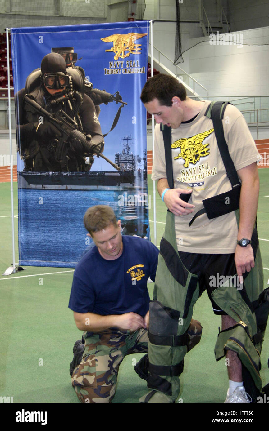 A Senior Chief EOD technician demonstrates the proper use of a Med-Eng ...