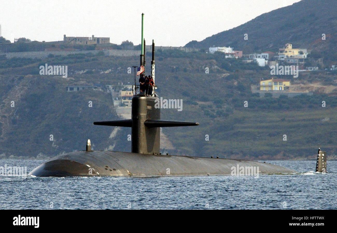 Port bow view showing US Navy (USN) Sailors manning a topside watch ...