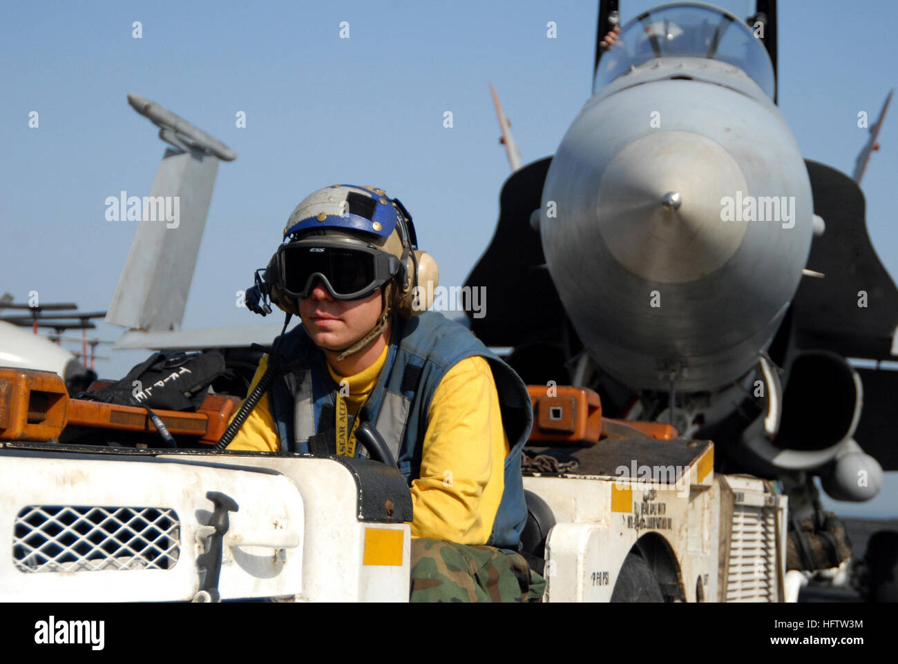 Us navy flight deck tractor hi-res stock photography and images - Alamy