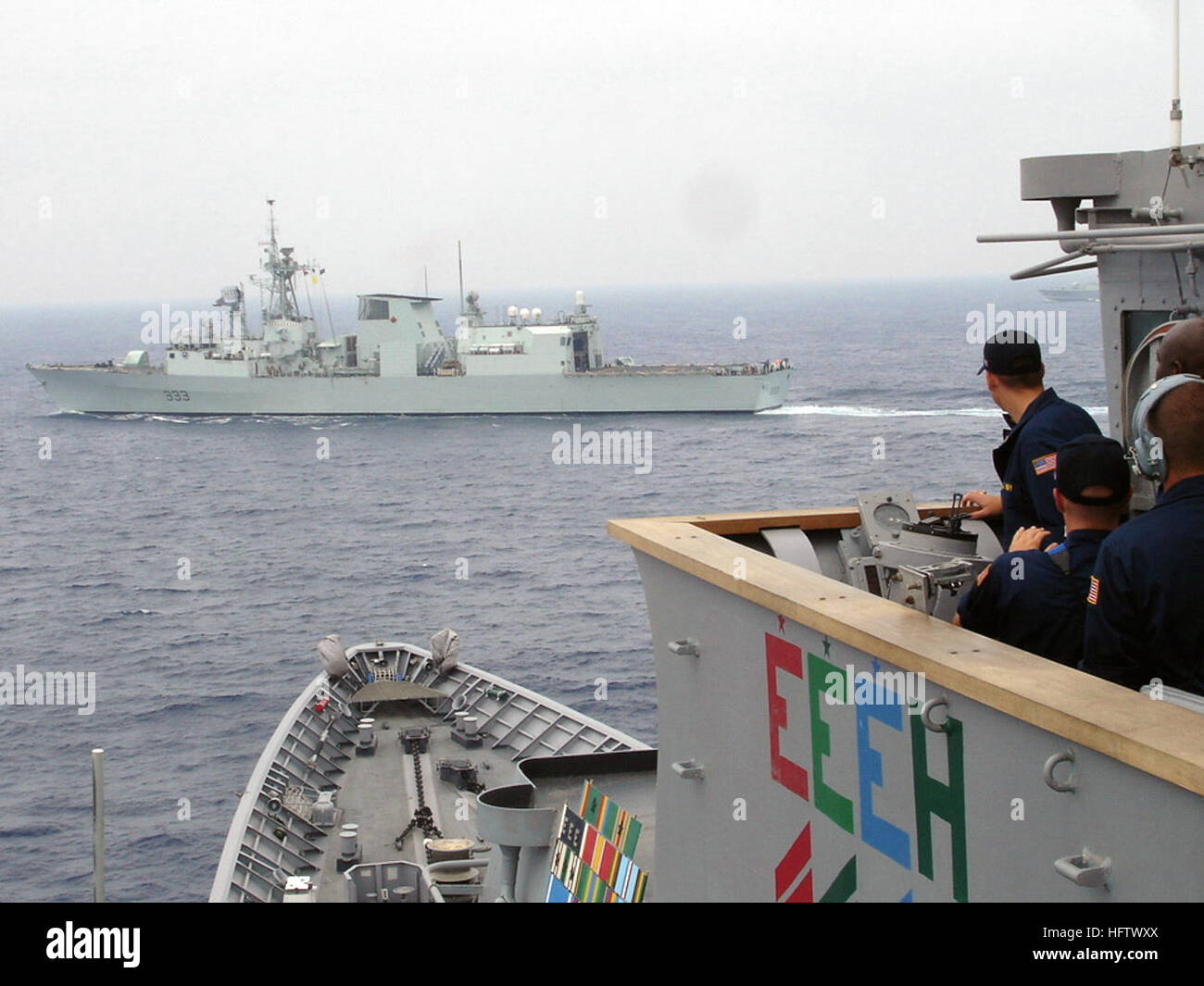 070804-N-2889B-001 ATLANTIC OCEAN (Aug. 4, 2007) - Sailors watch as the ...