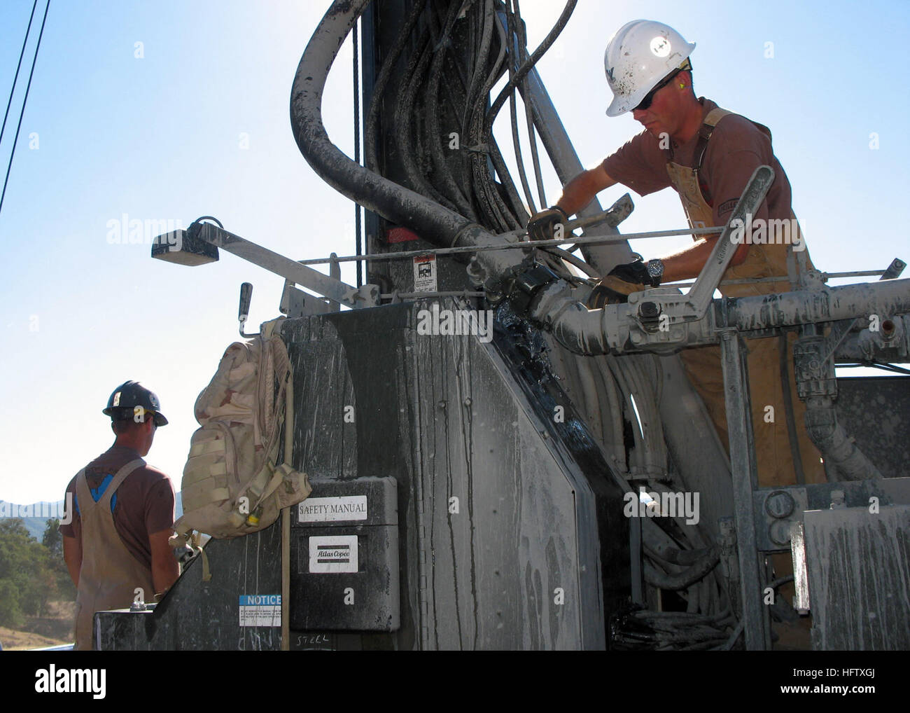A seabee attached to naval mobile construction battalion nmcb 5 hi-res ...