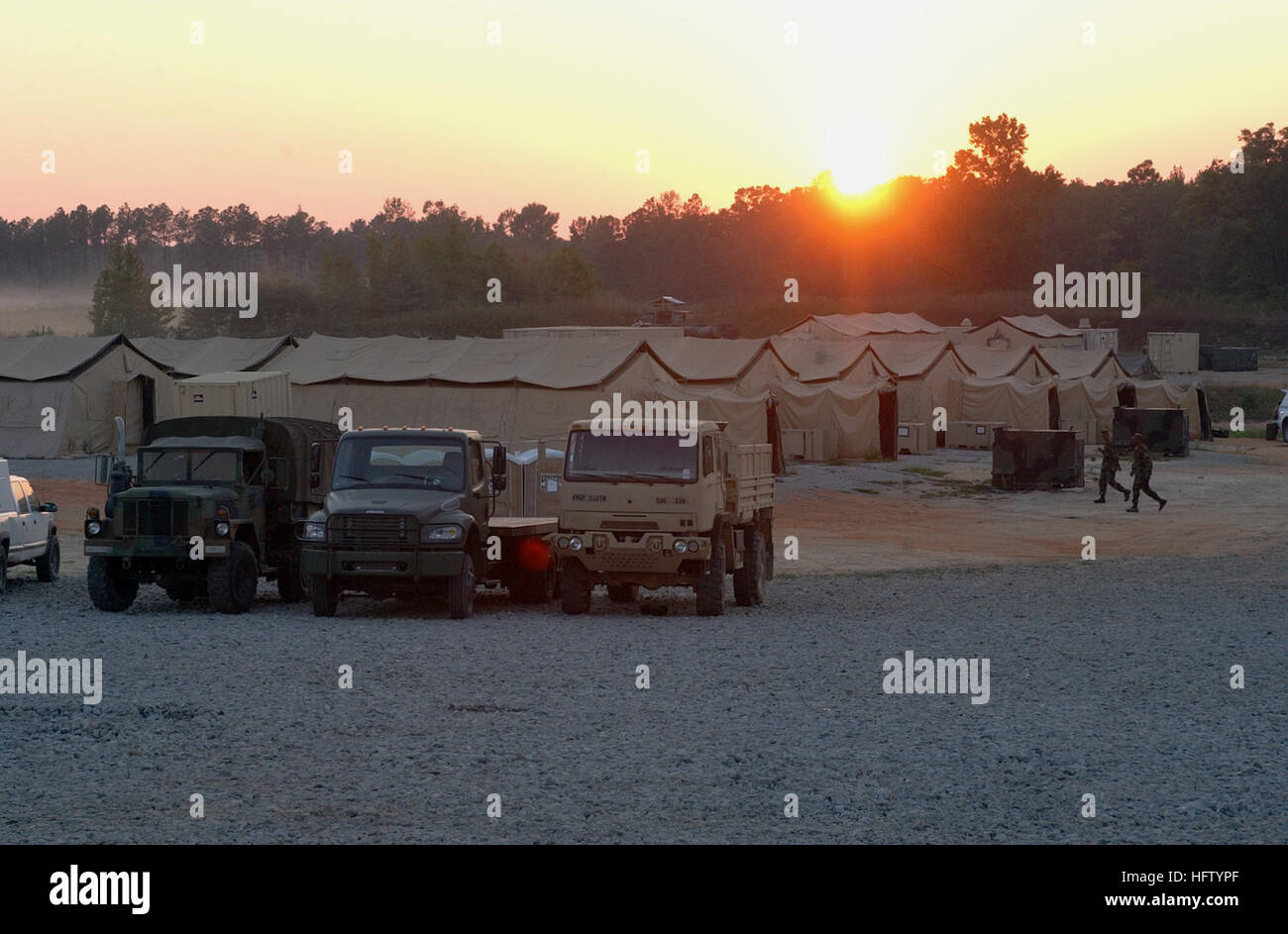 The sun sets over the command and control center during Exercise COMET ...