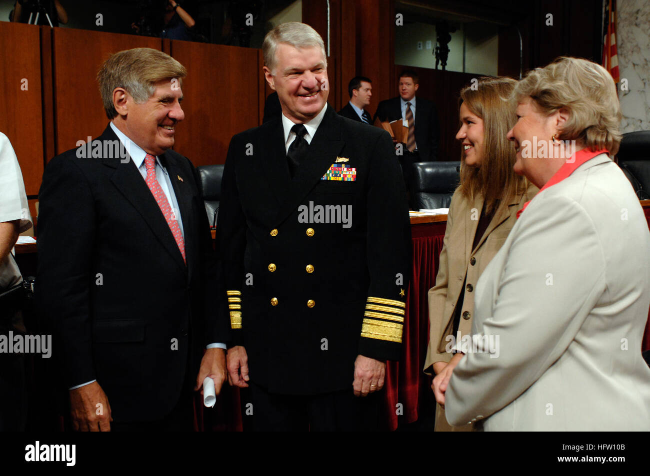 The U.S. Fleet Forces Commander meets with a senator prior to ...