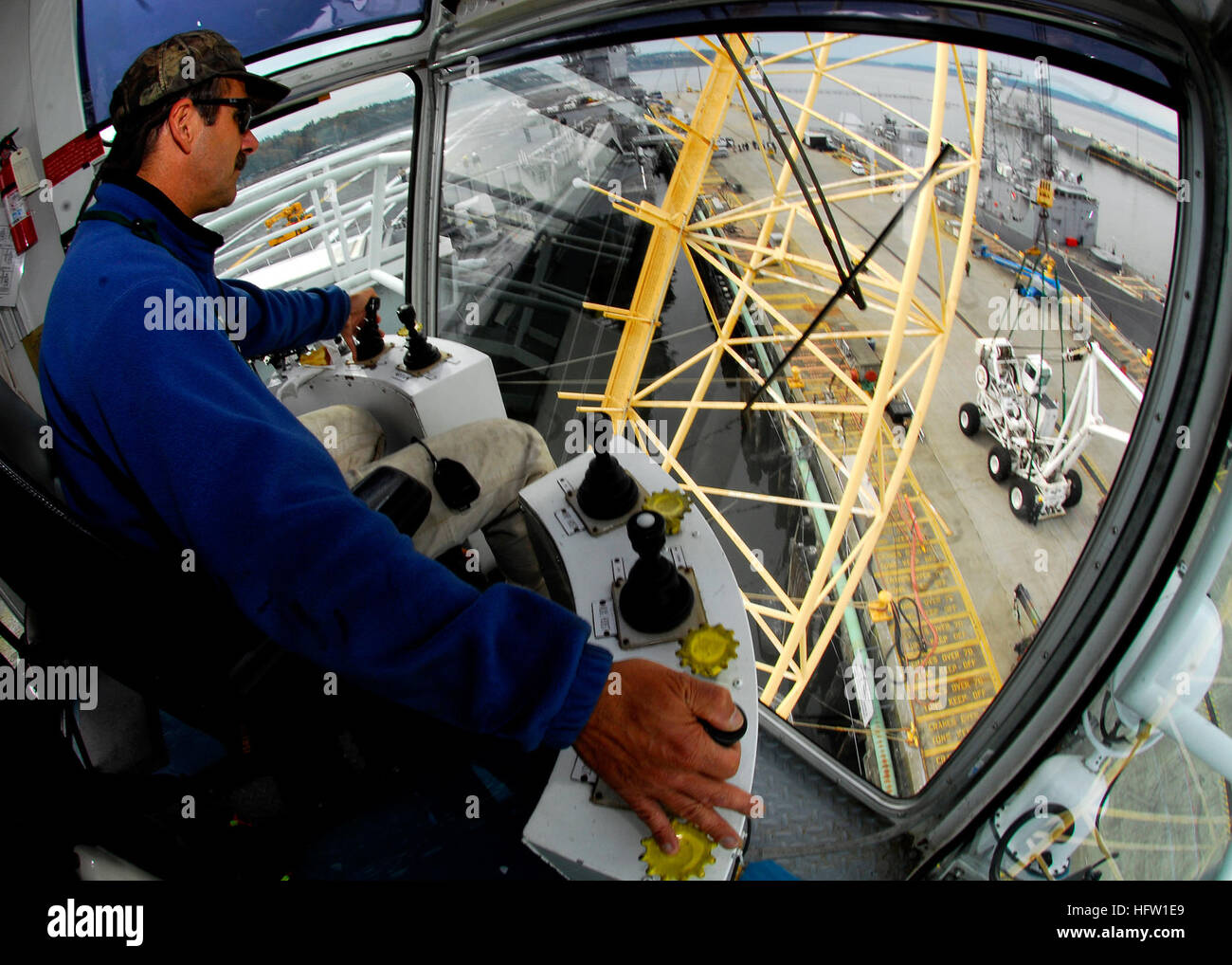 A Puget Sound Naval Shipyard crane operator moves an emergency heavy ...