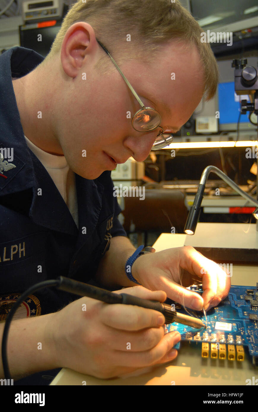 Miniature repair electronics hi-res stock photography and images - Alamy