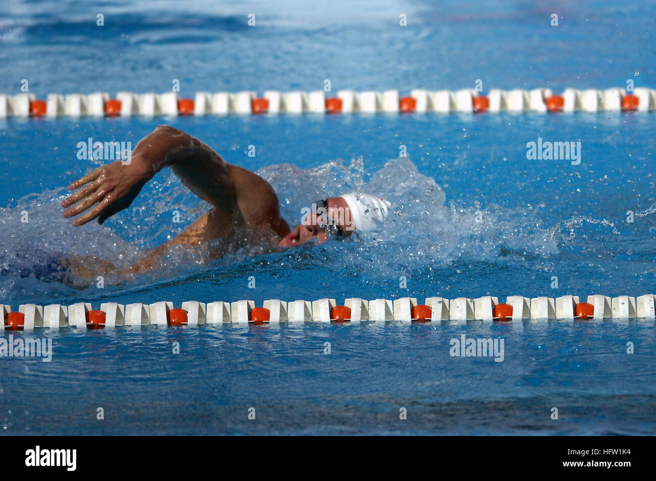 A military athlete competes in the 400-meter swim at the 4th ...