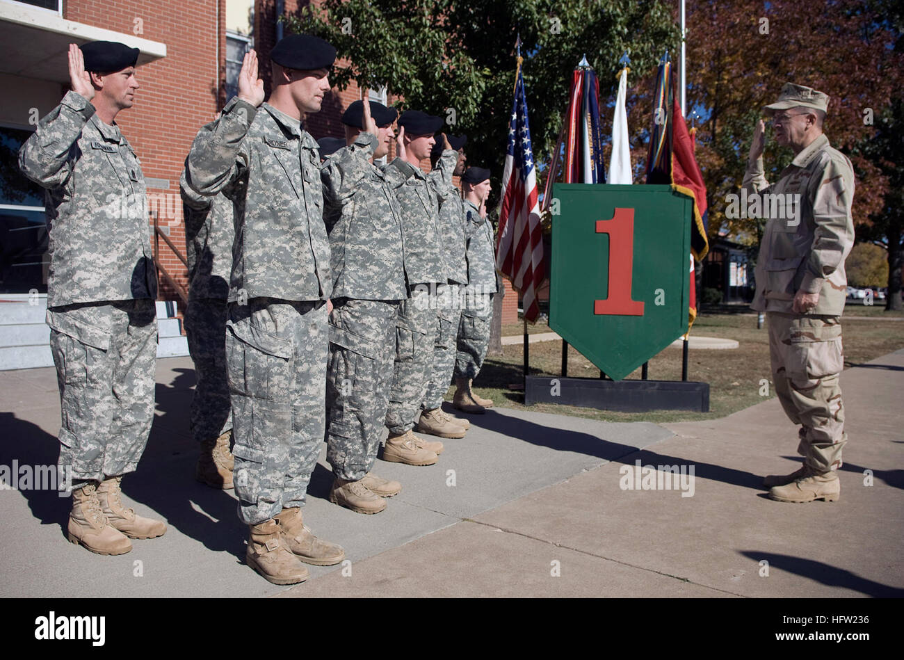 The Chairman of the Joint Chiefs of Staff reenlists nine members of the ...