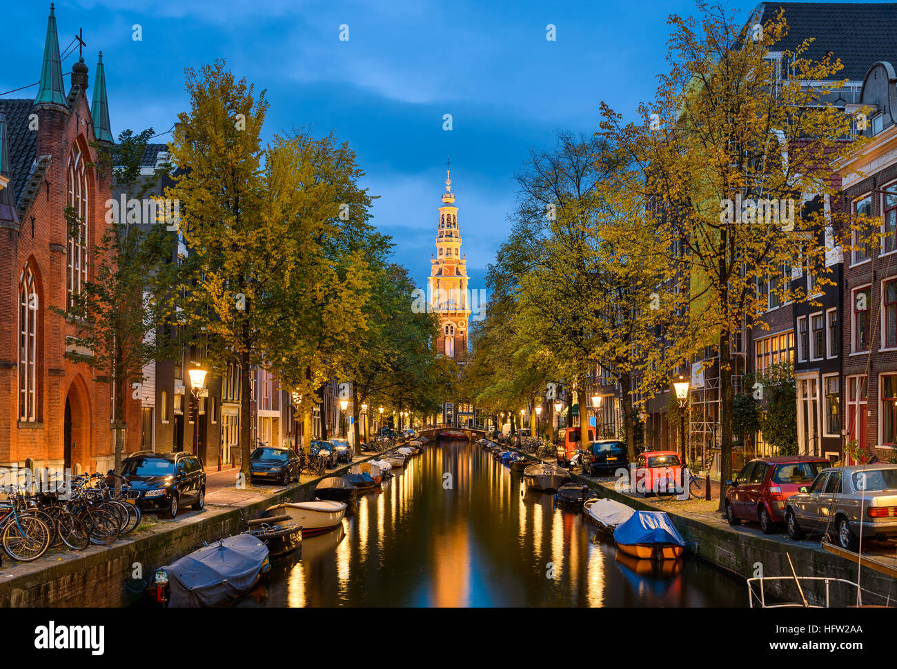 View of a church and a canal in Amsterdam, Netherlands at night Stock ...