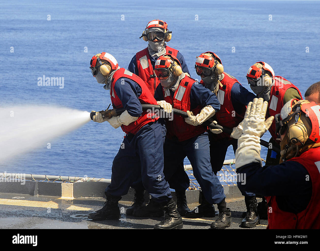 Flight deck firefighting team aboard USS Vella Gulf (CG 72) conducts ...