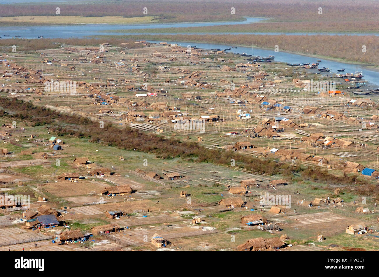 An aerial view of damage to homes following Cyclone Sidr, which swept ...