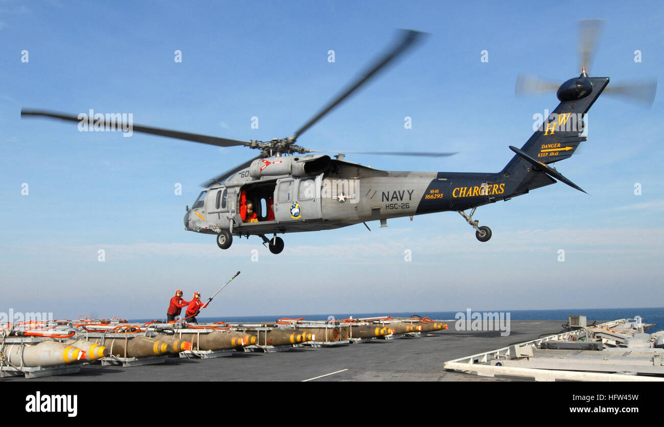 Sailors on USS Dwight D. Eisenhower (CVN 69) conduct vertical ...
