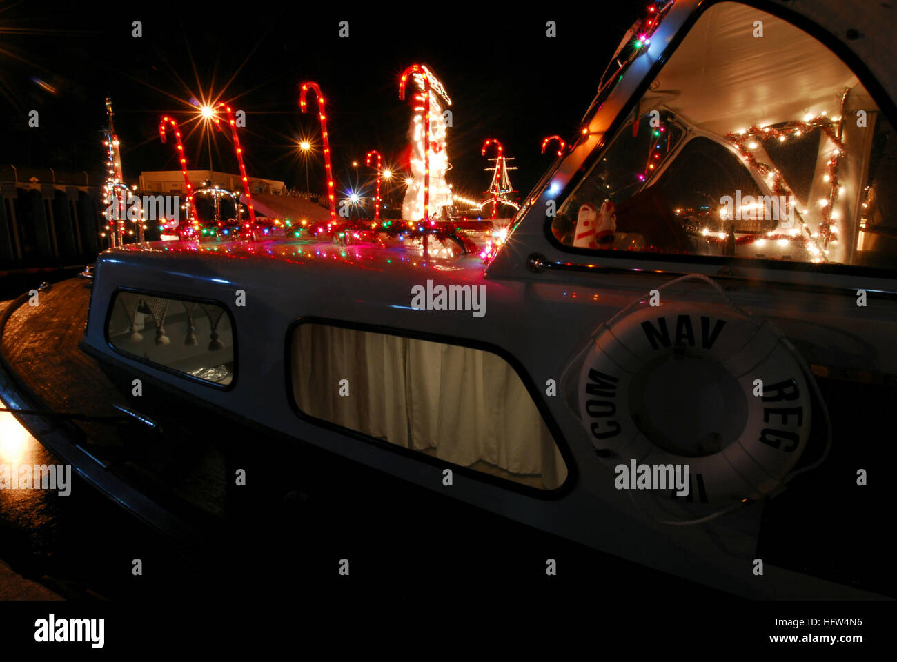 Holiday lights illuminate Commander, Navy Region Hawaii barge at pier ...
