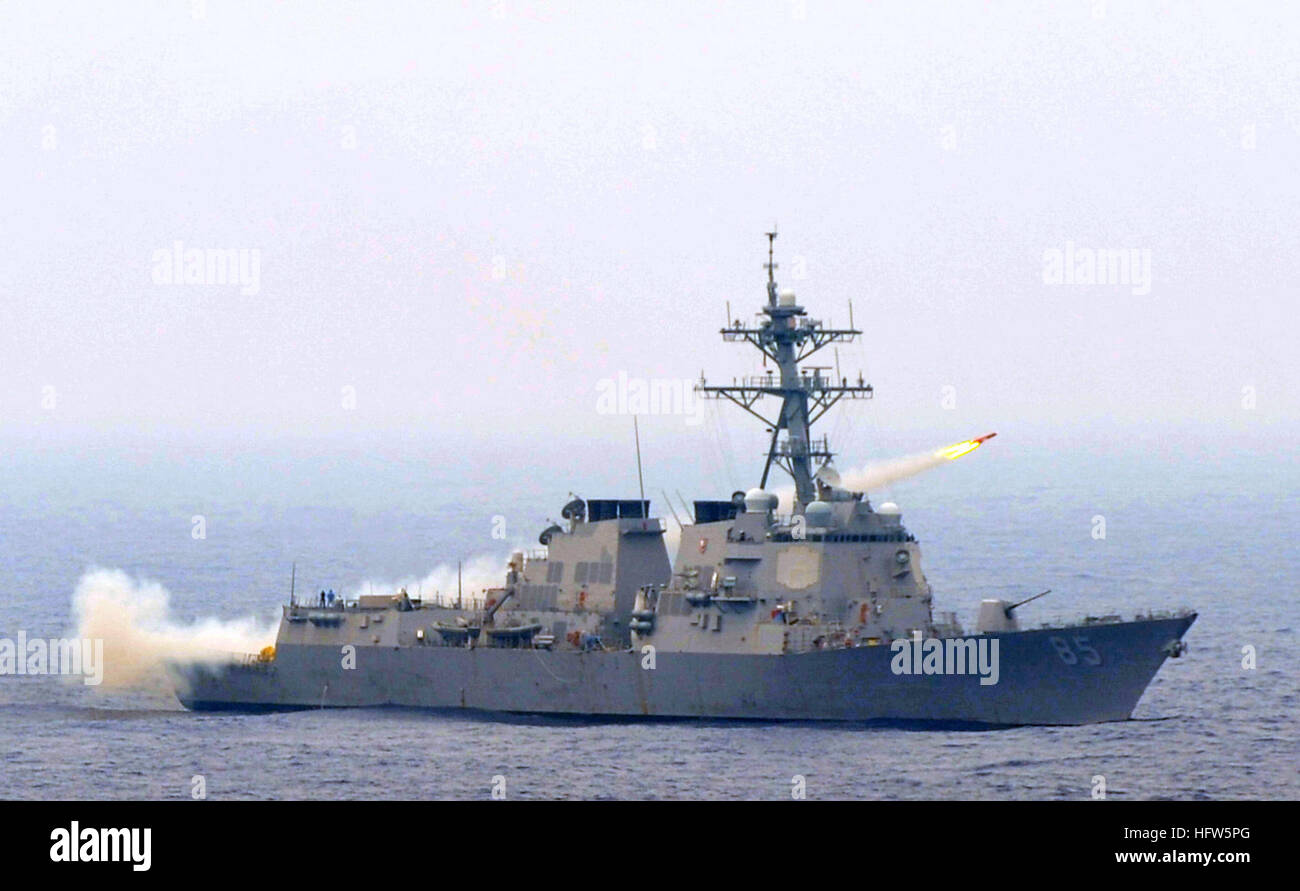 The guided-missile destroyer USS McCampbell fires a drone during a test ...