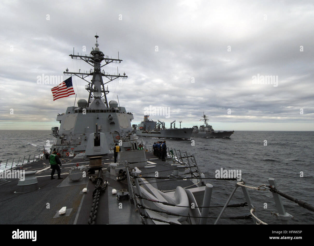 USS Momsen (DDG 92) completes a refueling-at-sea operation with USNS ...