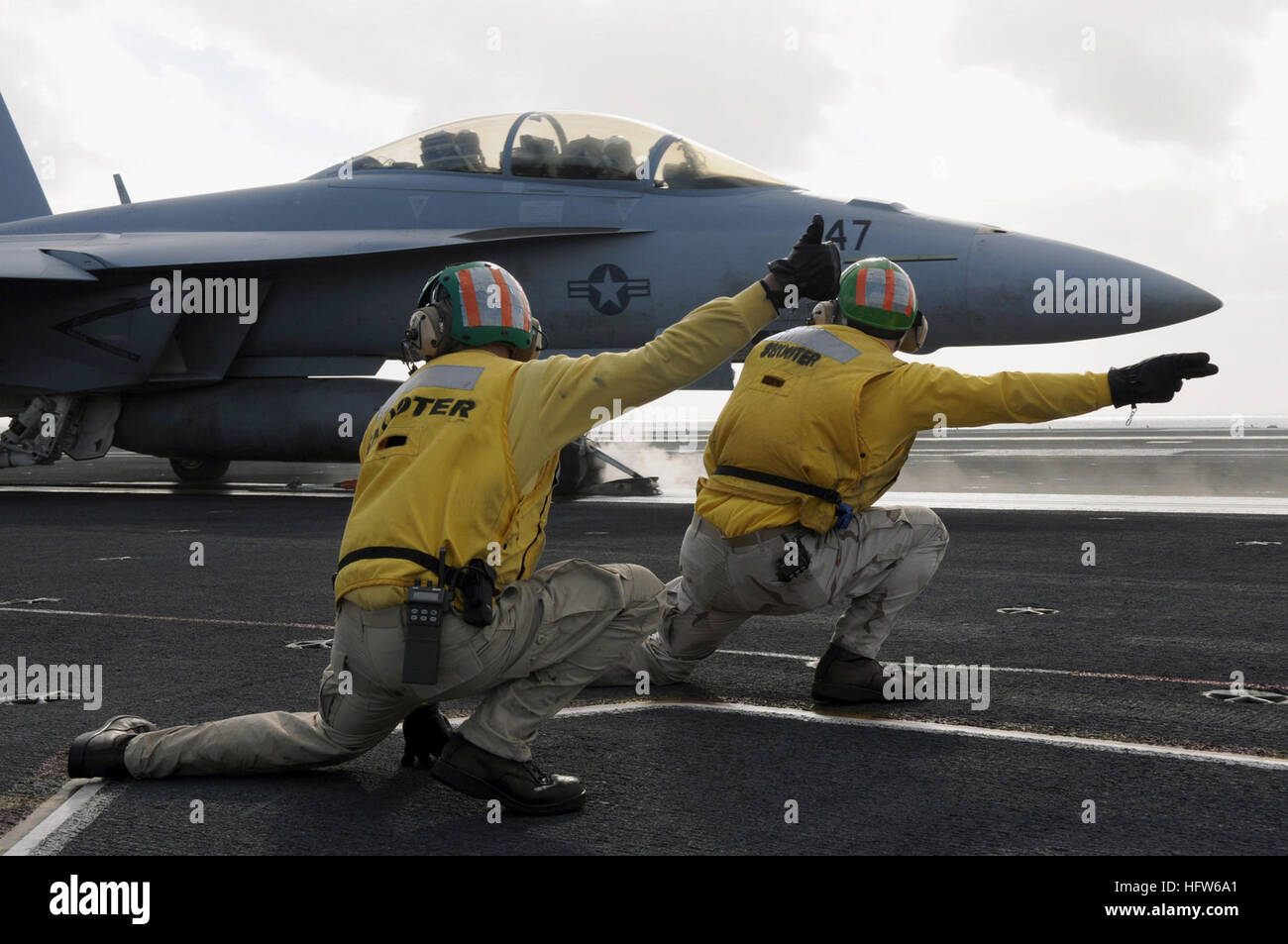 080130-N-0555B-015 PACIFIC OCEAN (Jan. 30, 2008) Two catapult officers ...