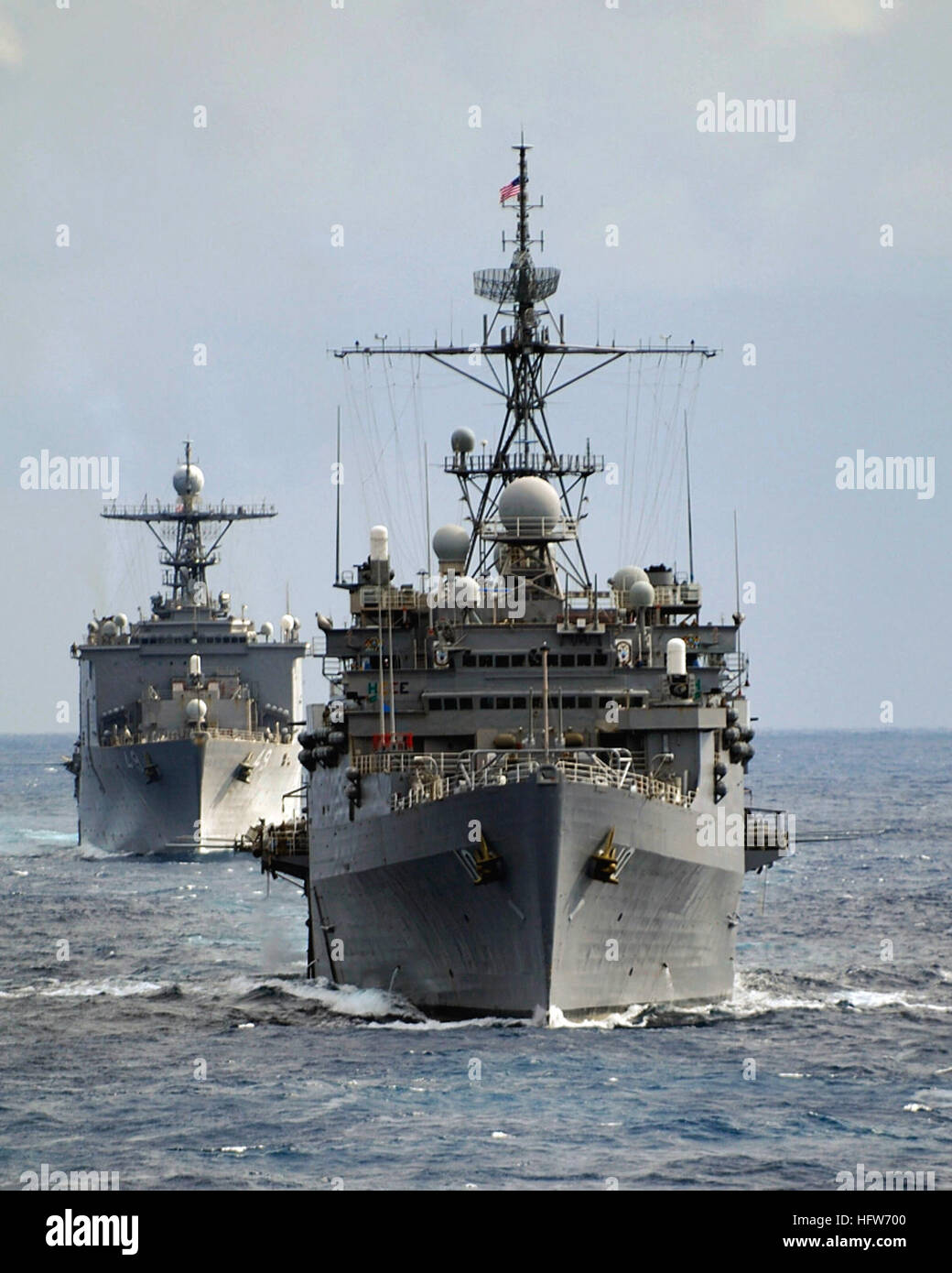 USS Juneau (LPD 10) and USS Harpers Ferry (LSD 49) maneuver behind USS ...