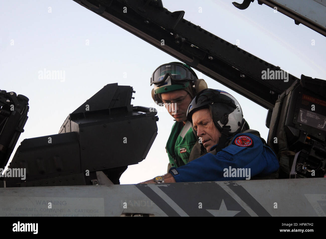 A rear-seat pilot prepares for a carrier launch aboard an F/A-18F Super ...