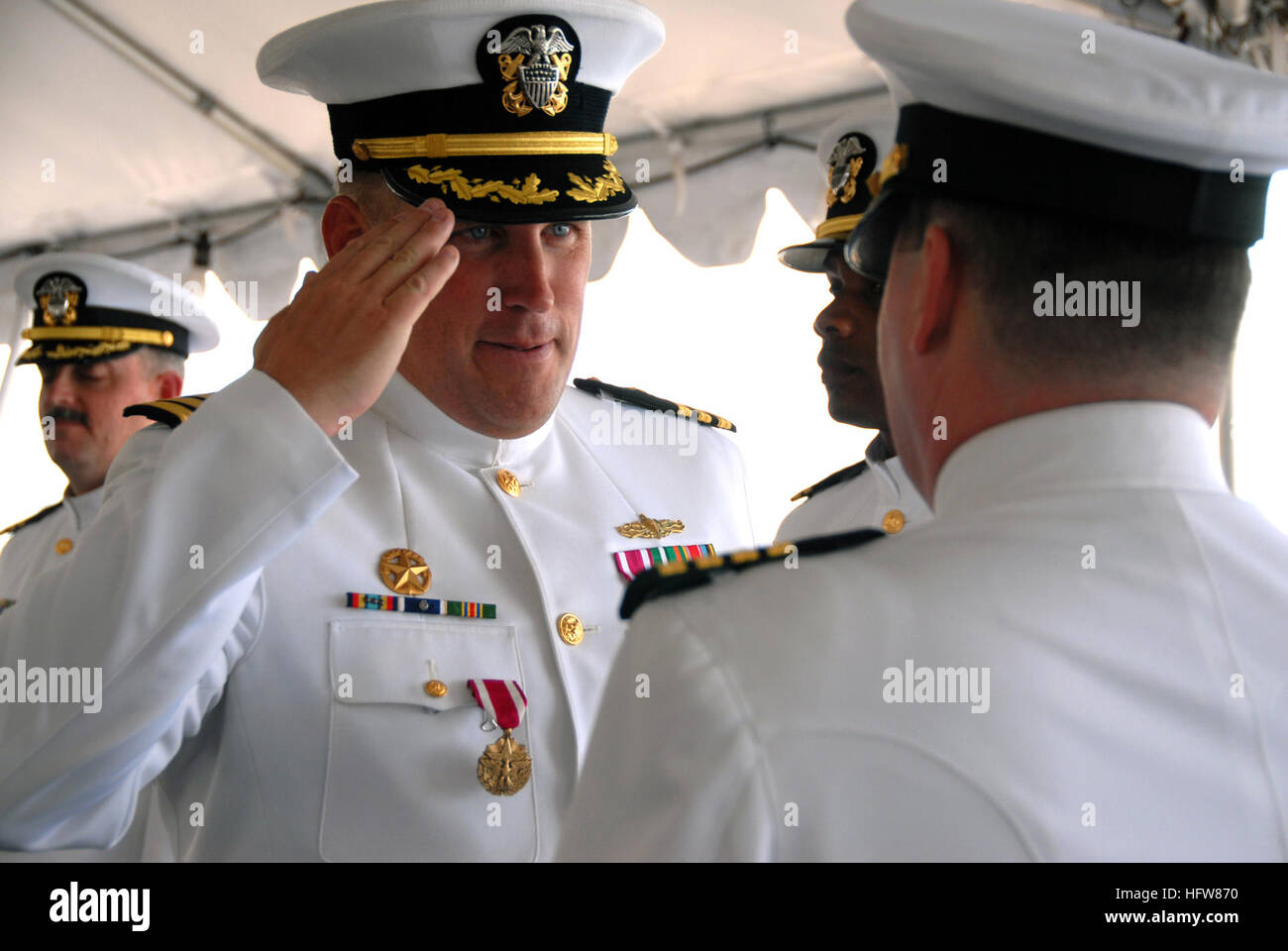 Commander Chris J. Bushnell, commanding officer of the Arleigh Burke ...