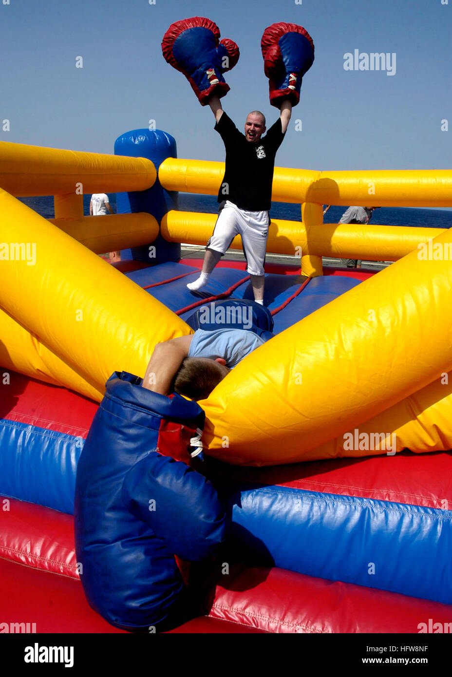 Boatswain's Mate celebrates victory in a steel beach boxing match ...