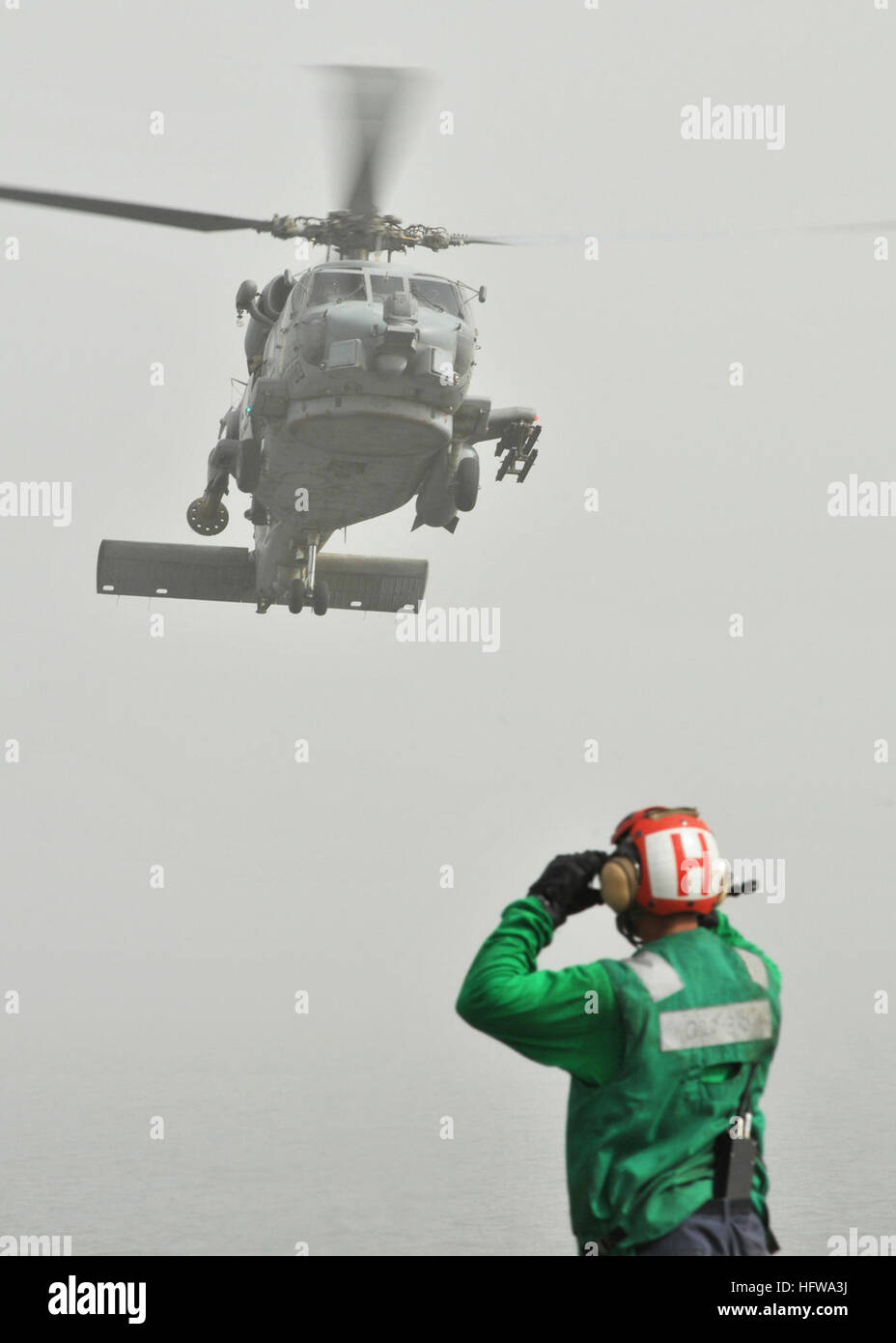 080702-N-7981E-474 PERSIAN GULF (July 2, 2008) A landing signalman ...