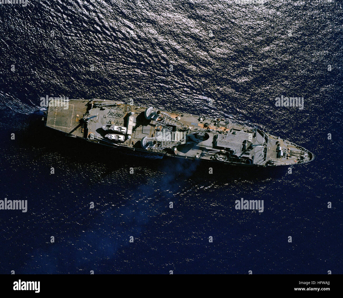 An overhead view of the submarine tender USS HUNLEY (AS 31) underway ...
