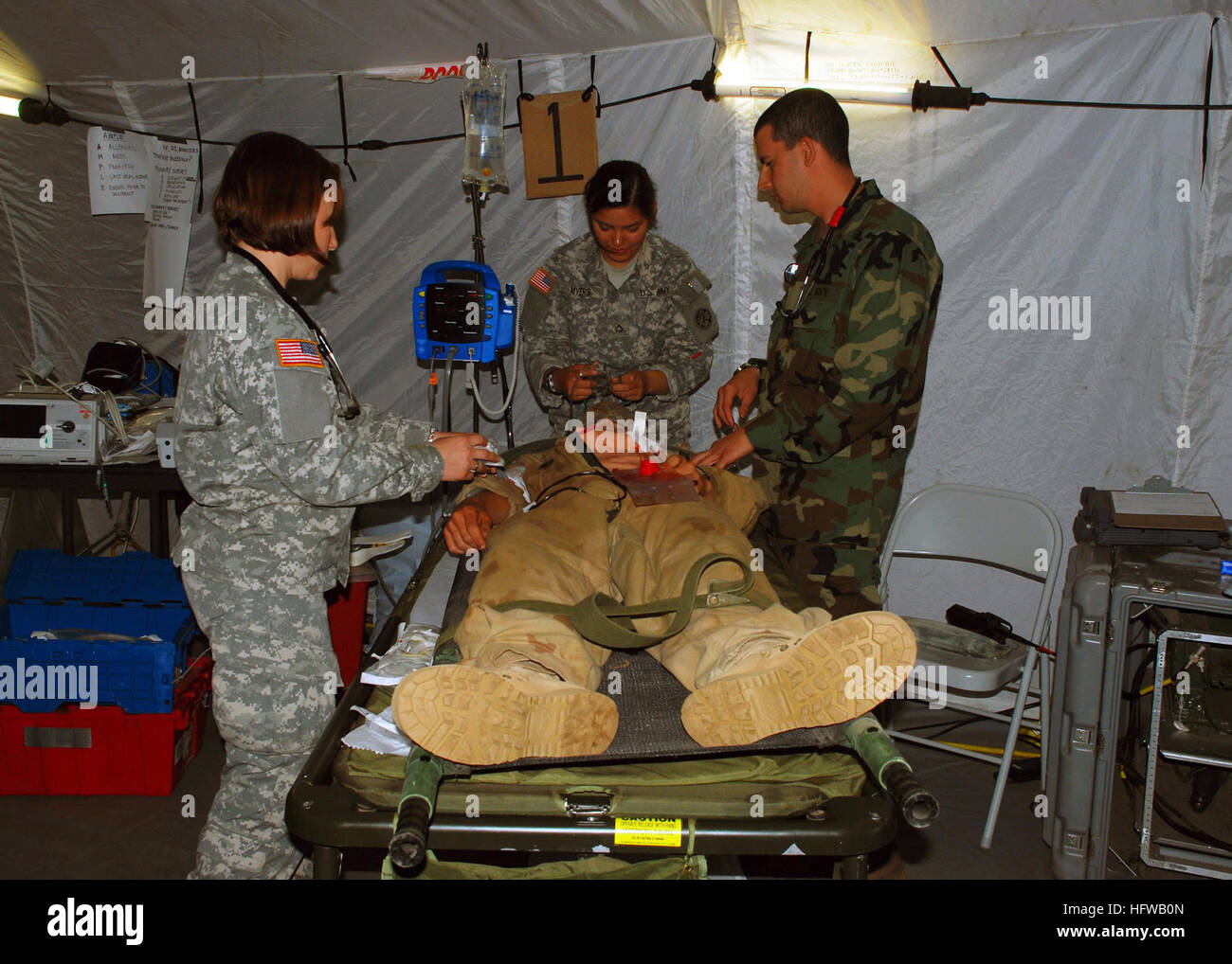 Medical personnel treat simulated casualties at Camp Pendleton during a ...
