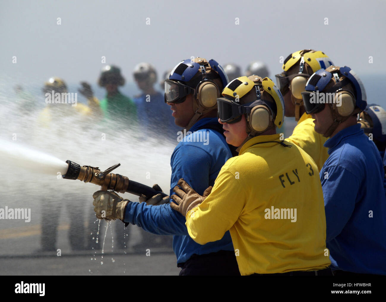 Fire hose handling techniques hi-res stock photography and images - Alamy