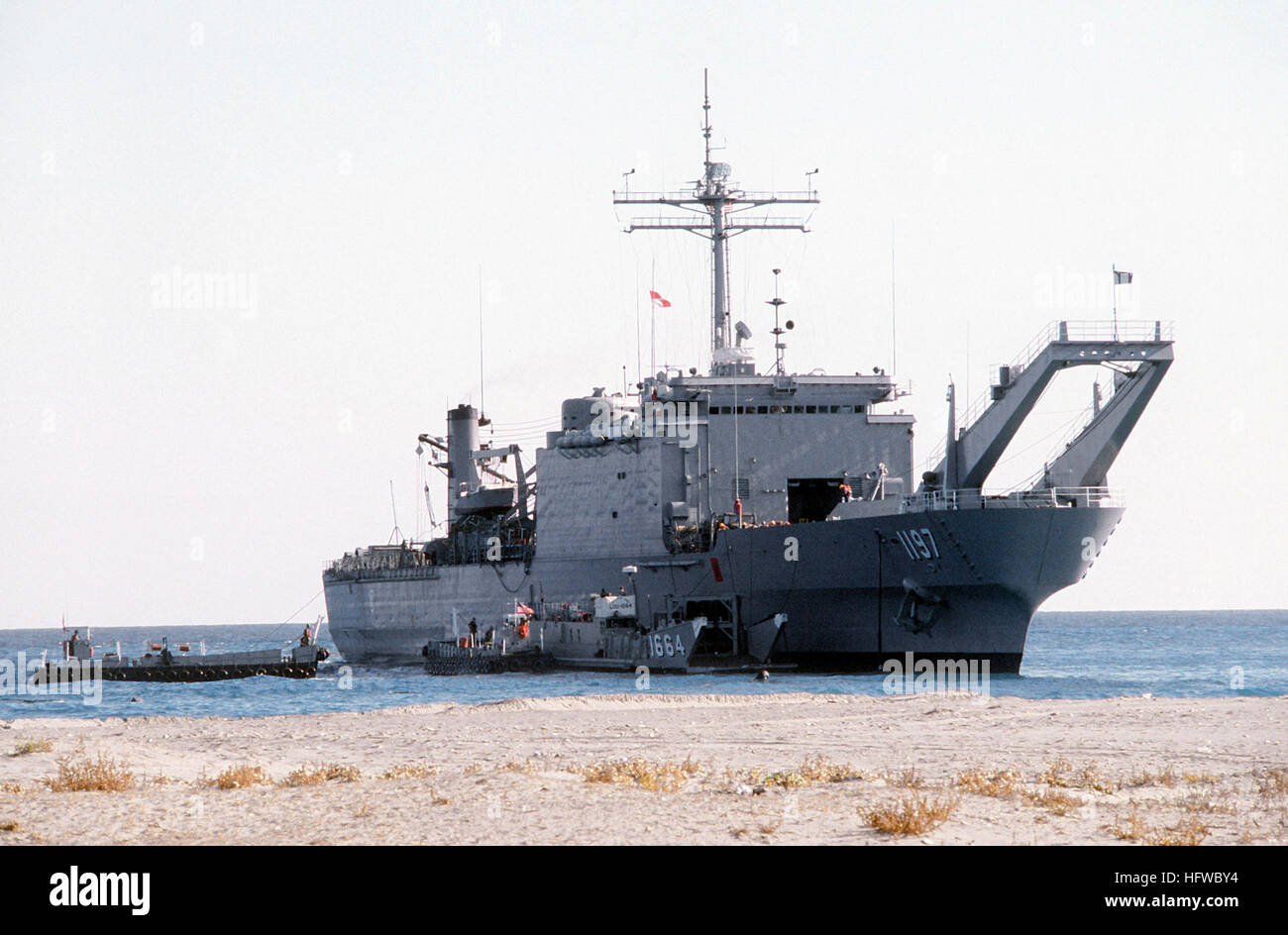 A starboard bow view of the tank landing ship USS BARNSTABLE COUNTY ...